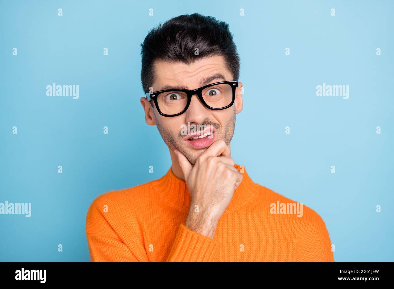 Photo of young man arm on chin wear glasses sullen face wear sweater ...