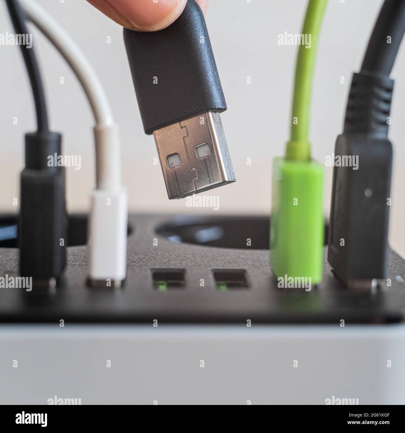 Modern convenient multi-port usb charger for devices. Close-up of ...