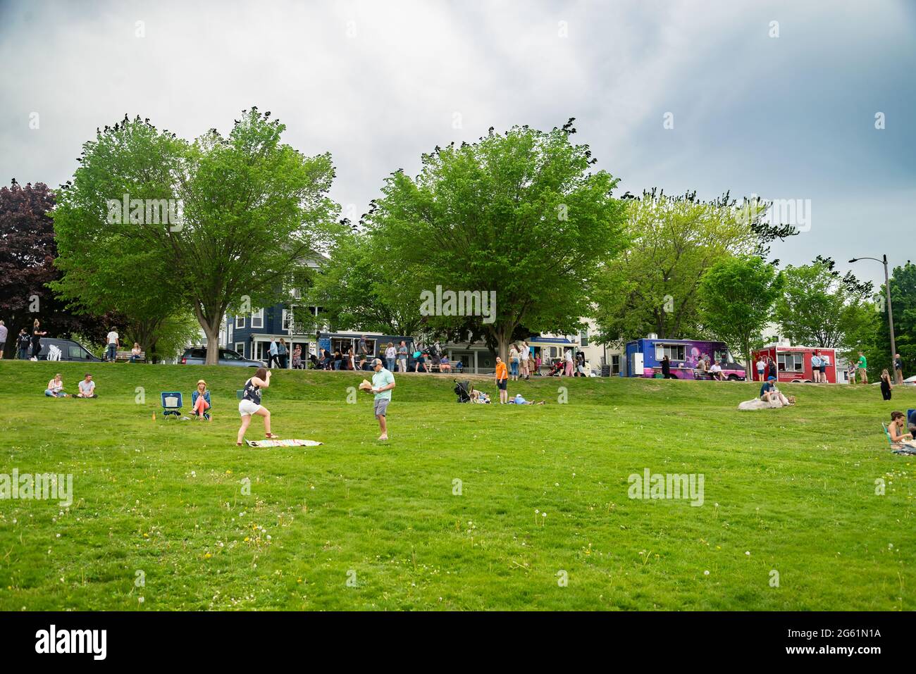 People enjoy free time on the Eastern Promenade in Portland, Maine ...