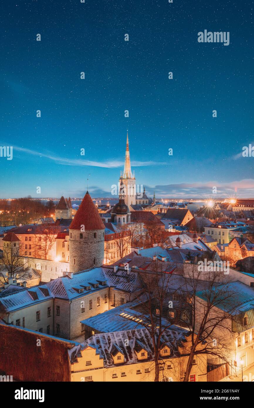 Tallinn, Estonia. Night Starry Sky Above Old Castle Walls Architecture ...