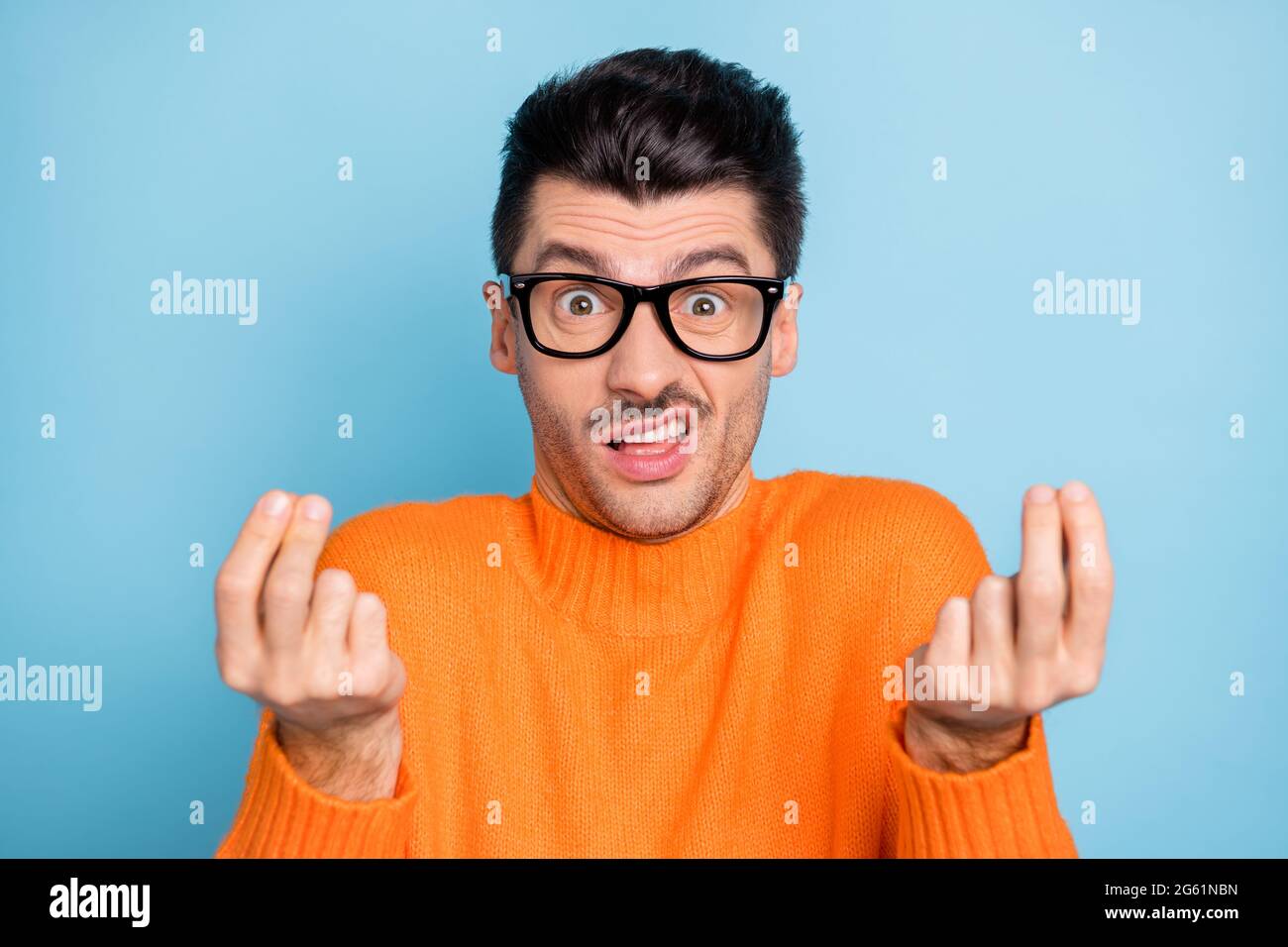 Portrait of puzzled person grin teeth two arms fingers show money ...