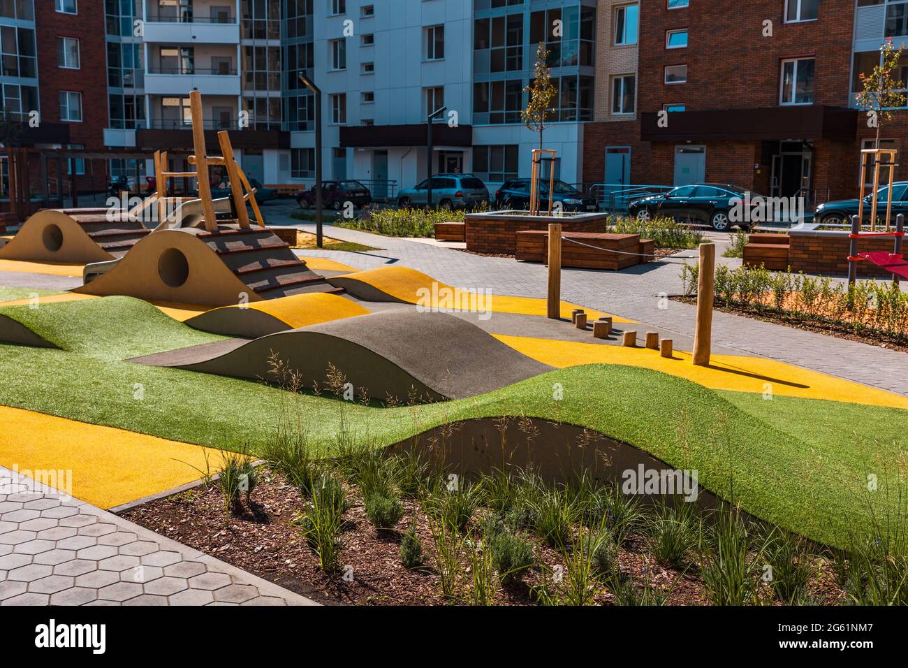 The courtyard of a modern residential building with equipments for ...