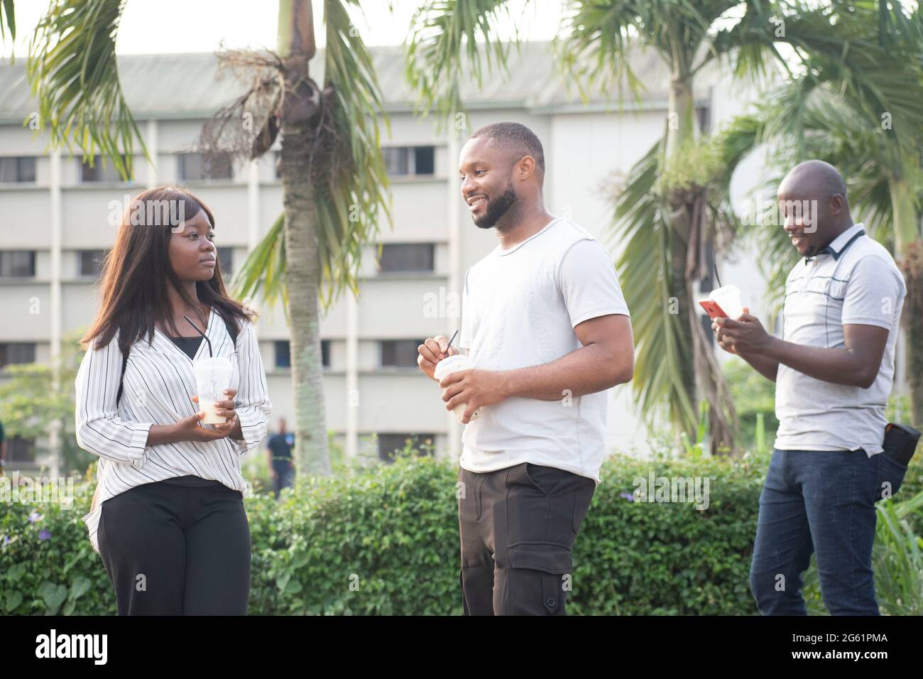 young african people discussing outdoor Stock Photo - Alamy