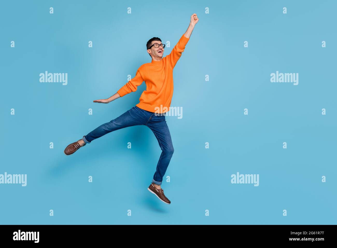 Full body profile photo of impressed person fist up jump look empty ...