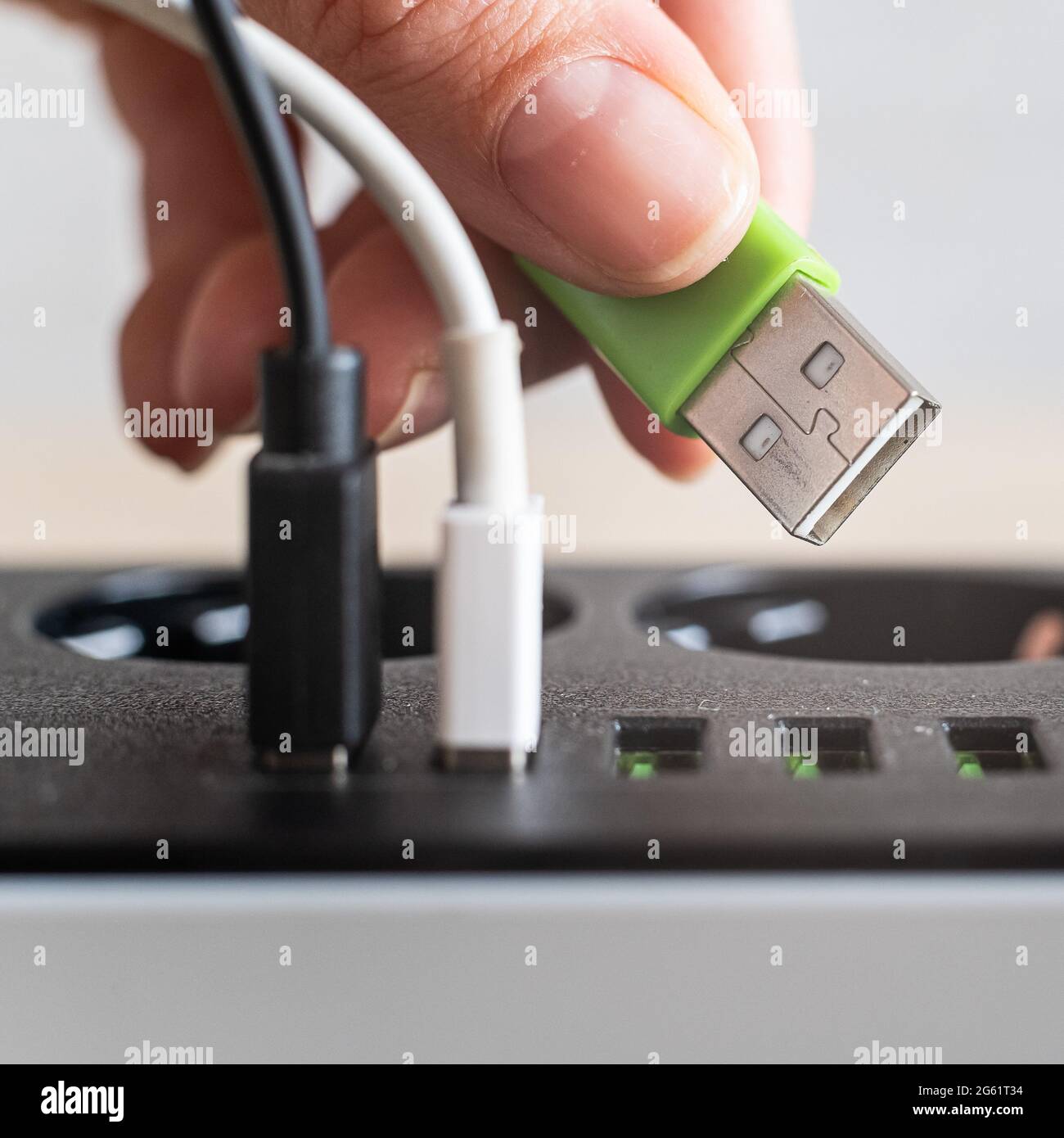 Modern convenient multi-port usb charger for devices. Close-up of a ...