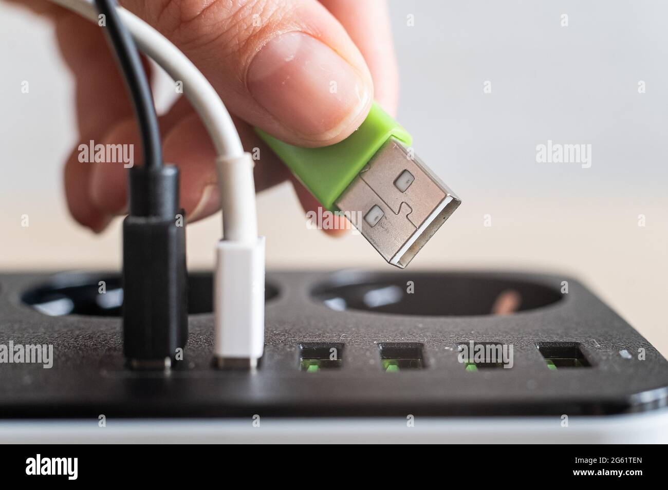 Hand plugging cables hi-res stock photography and images - Alamy