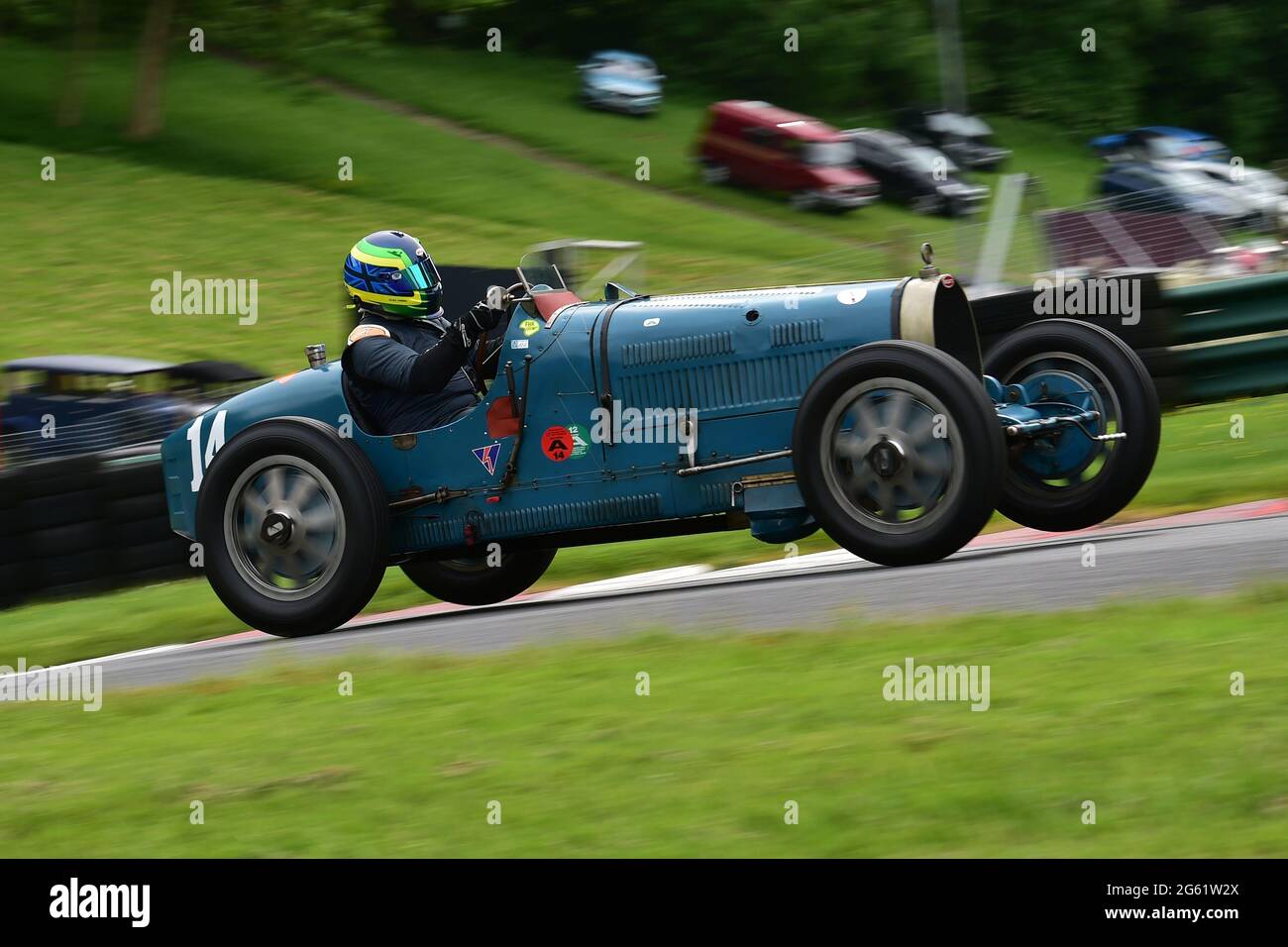 On two wheels as Alex Ames, Bugatti T35C charges up the Mountain ...