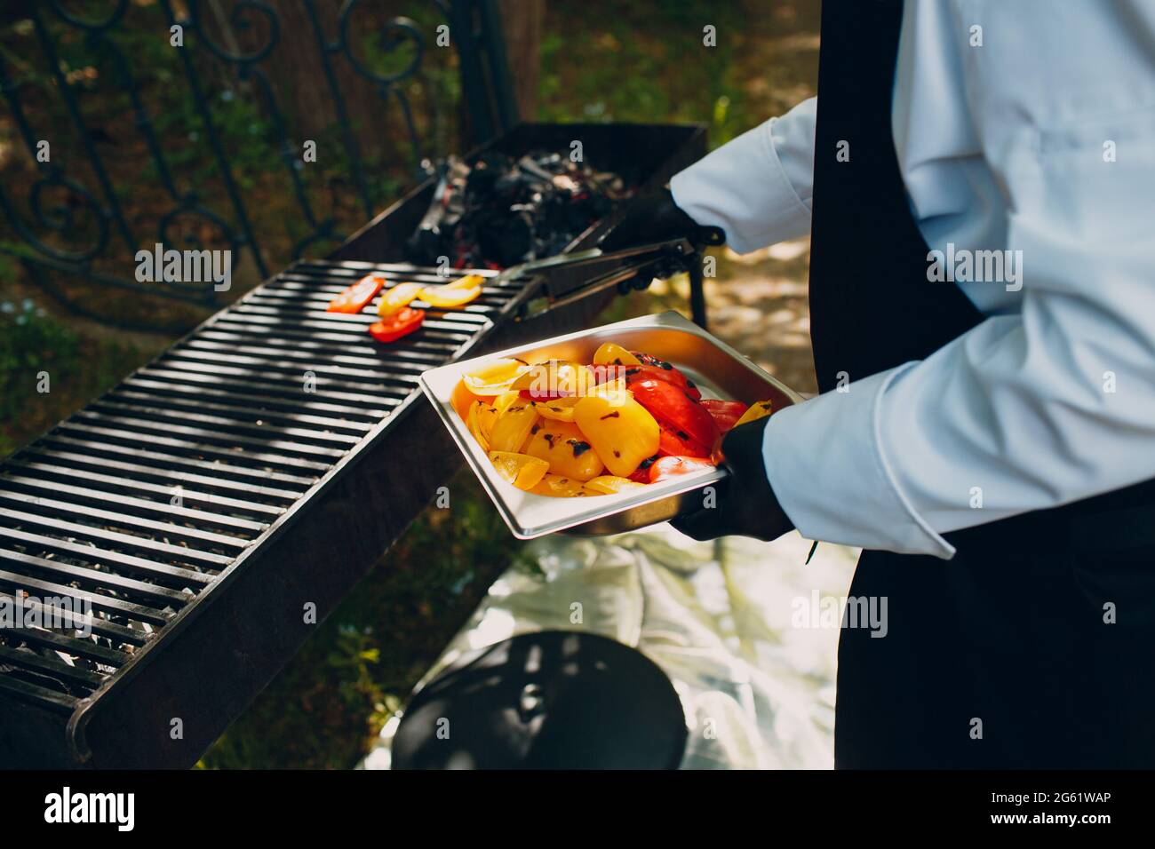 Hot open food catering grilled vegetables the waiter fries Stock Photo ...