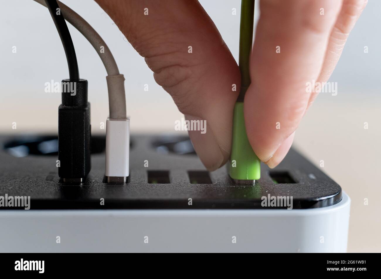 Modern convenient multi-port usb charger for devices. Close-up of a ... Modern convenient multi-port usb charger for devices. Close-up of a ...