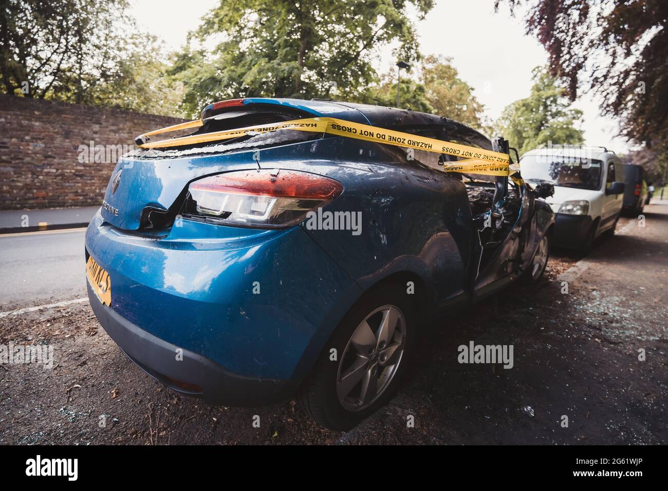 London | UK - 2021.06.12: An abandoned, stolen burnt out blue car ...