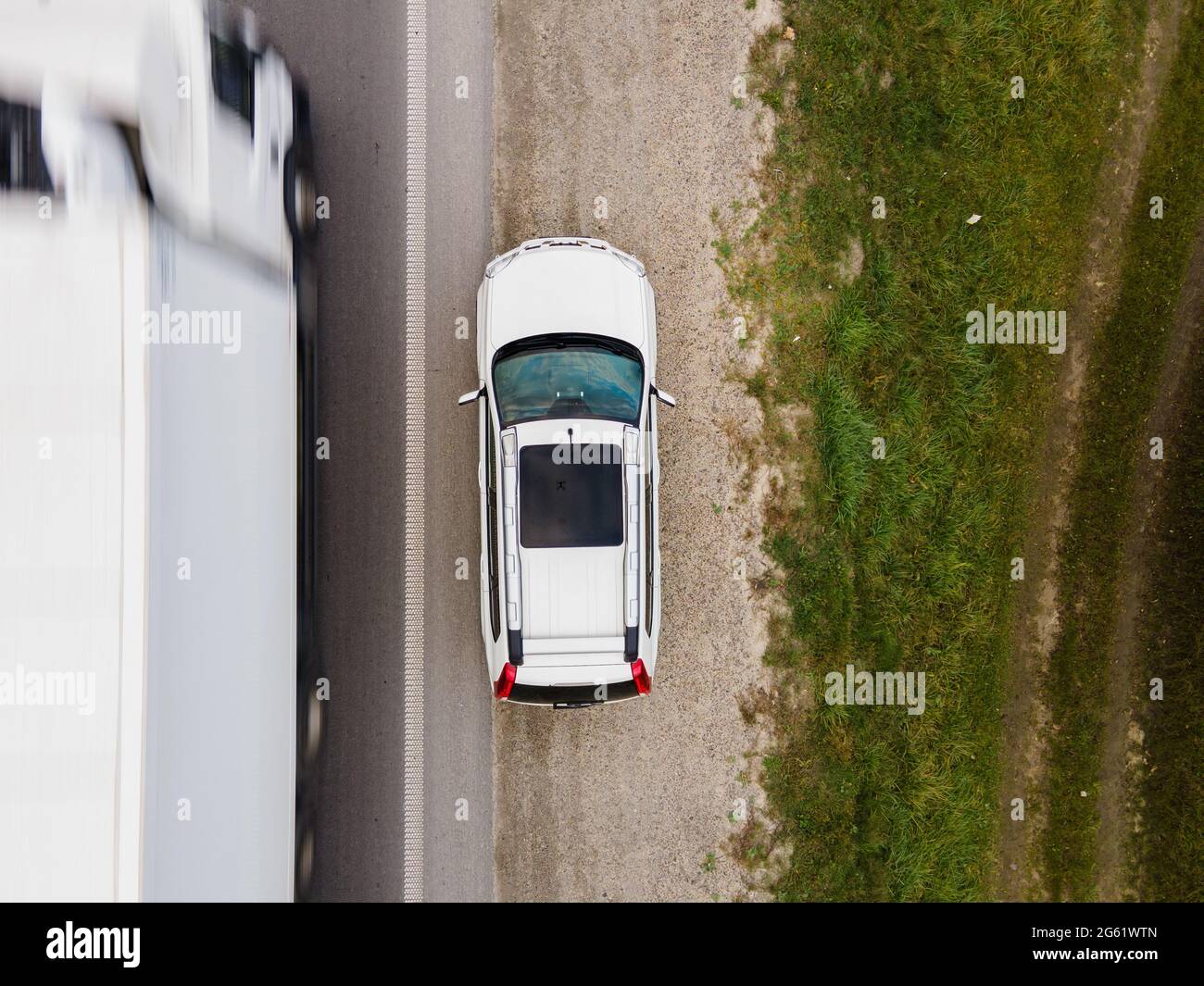 overhead top view of car parked at roadside copy space Stock Photo - Alamy