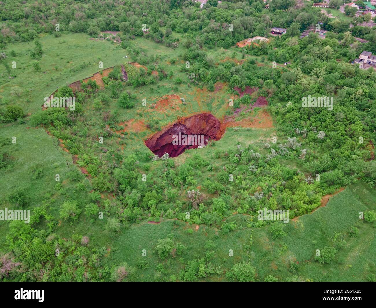 overhead view of collapsed mine big hole in land Stock Photo - Alamy