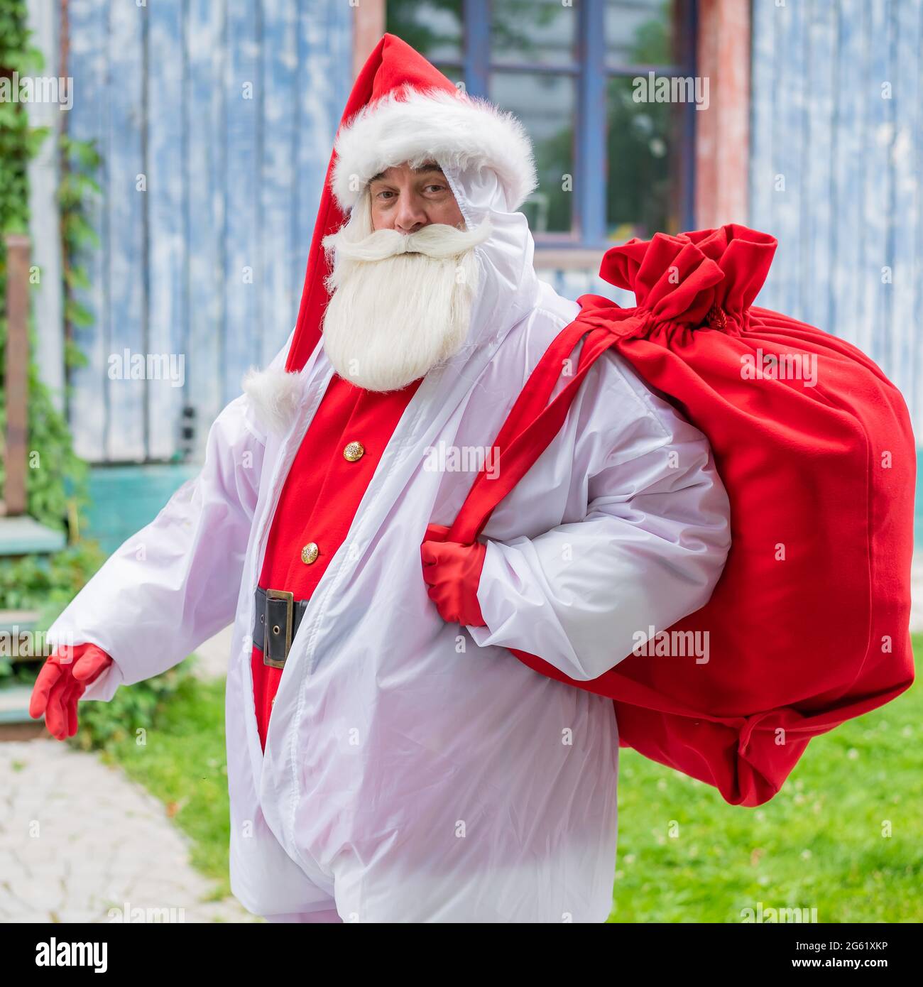 Santa claus in a protective suit during the coronavirus outdoors Stock ...