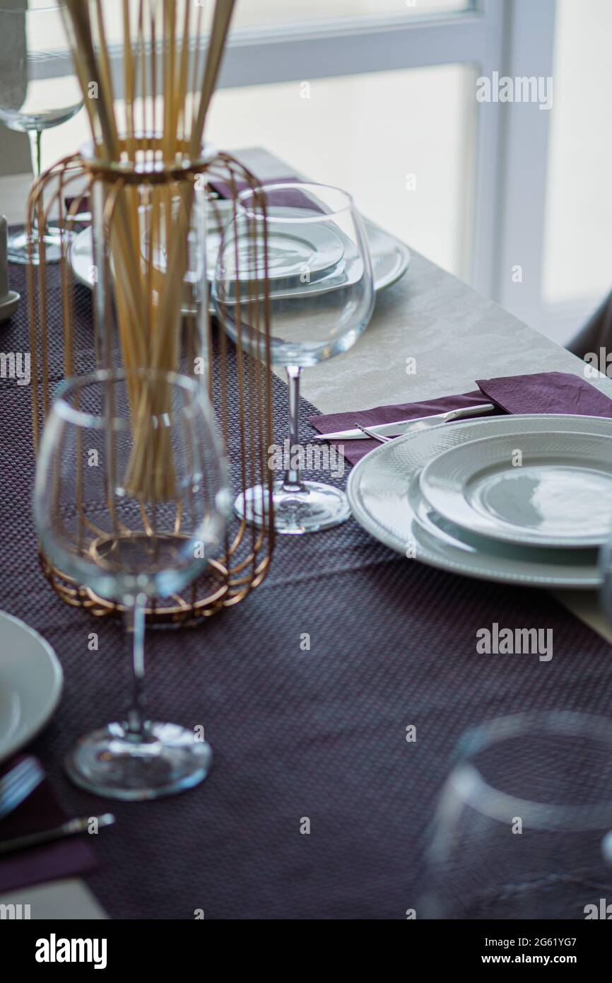 Table setting in the restaurant. Preparing the restaurant for receiving ...