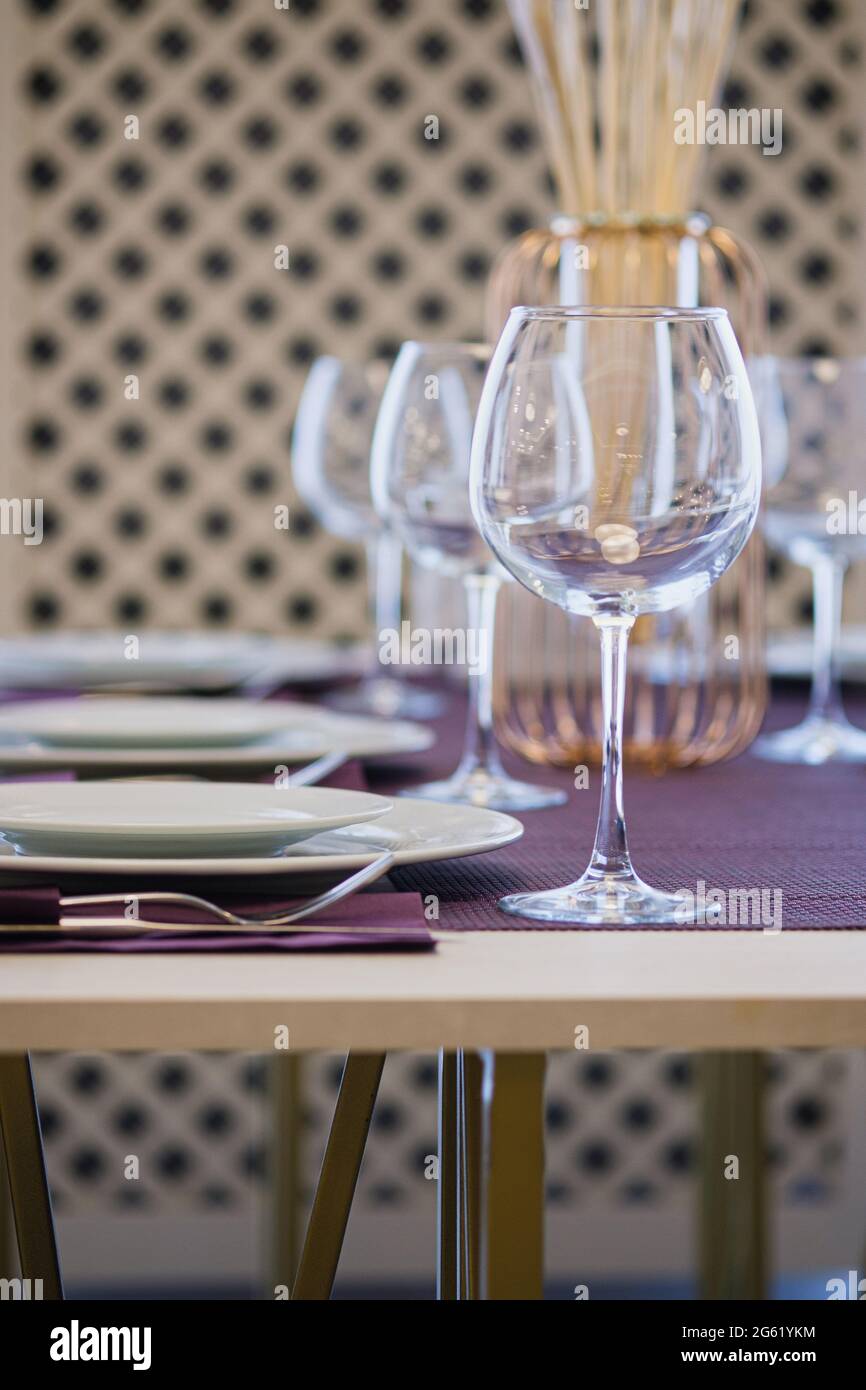 Table setting in the restaurant. Preparing the restaurant for receiving ...