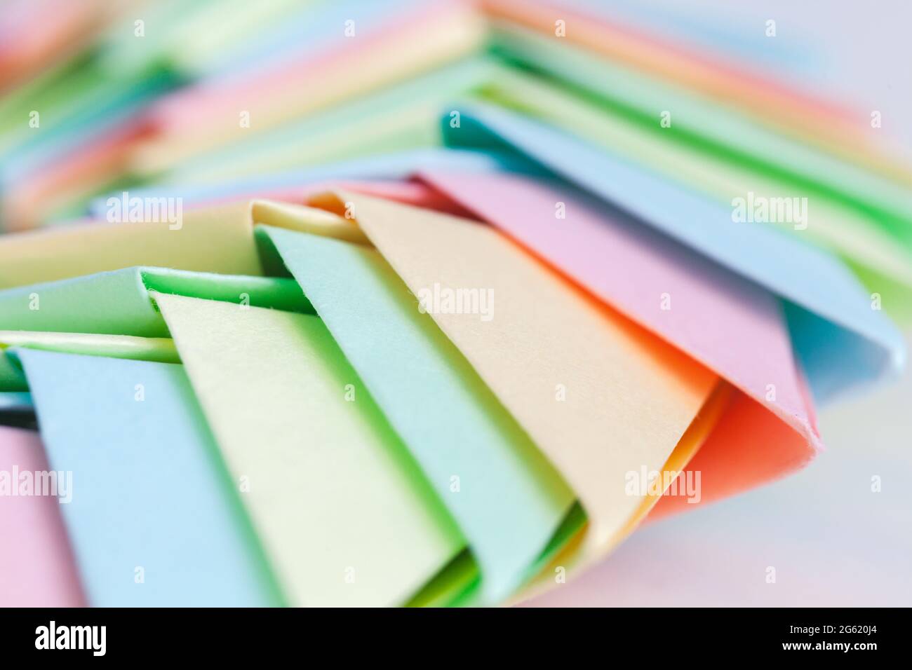 Origami background, close up photo with selective soft focus. Abstract ...