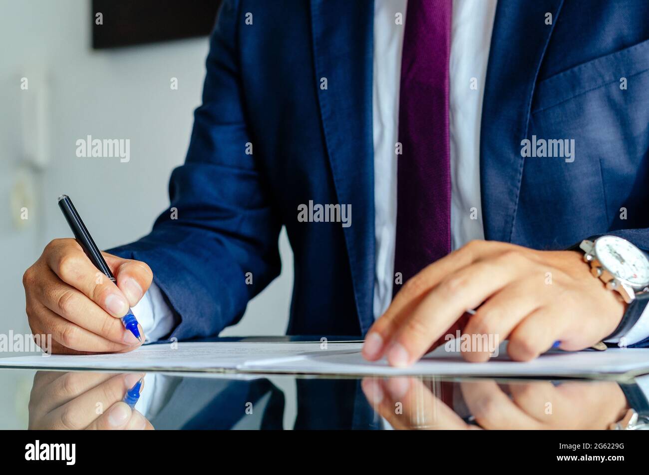 Close up businessman signing contract making a deal, classic business ...
