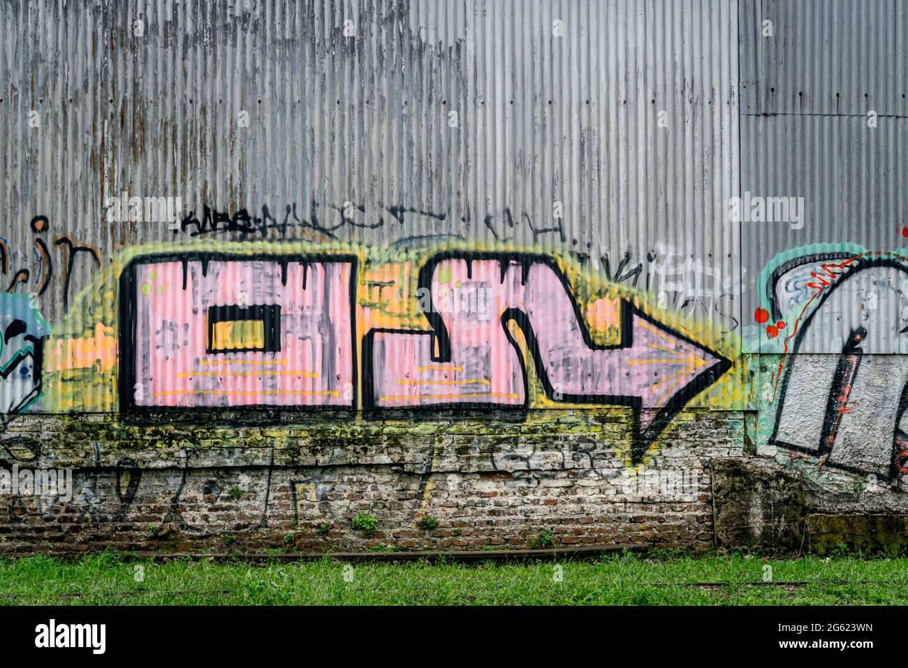 Graffiti painted on metal sheds in the railroad yard in Colegiales ...