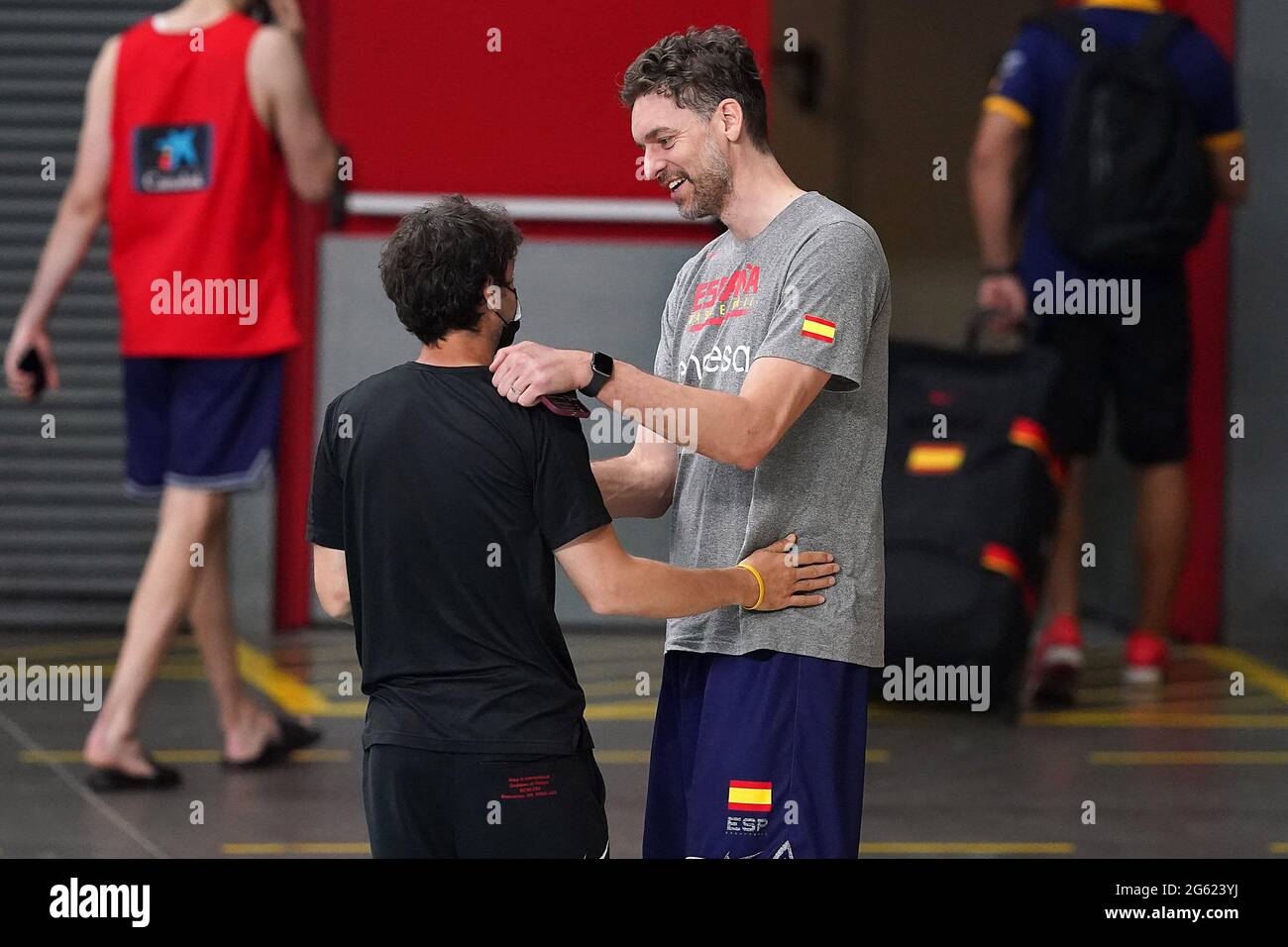 Ricky Rubio's personal trainer, former player Raul Lopez (l) with Pau ...