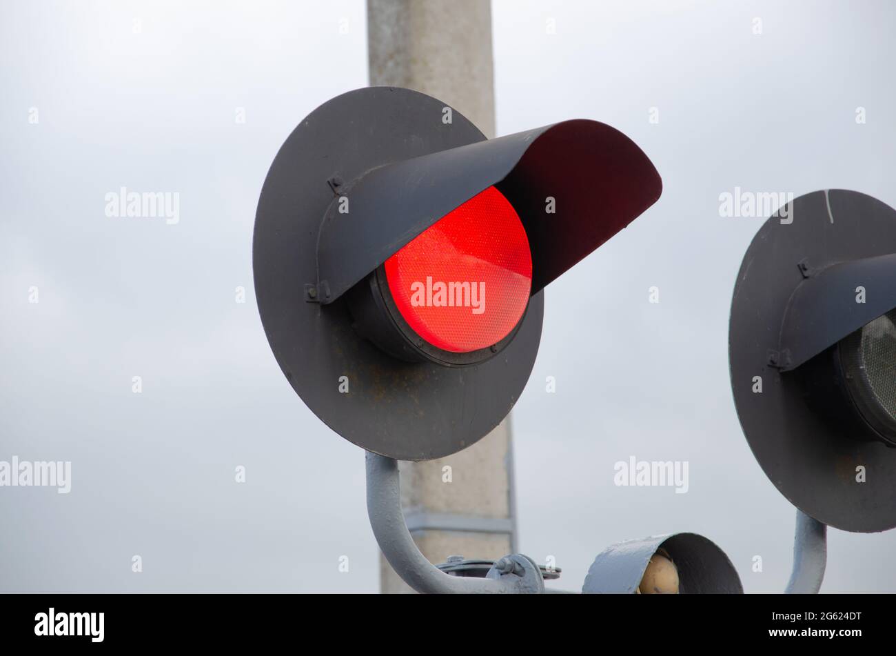 Square Grade crossing signal with red light gate and crossbuck at ...