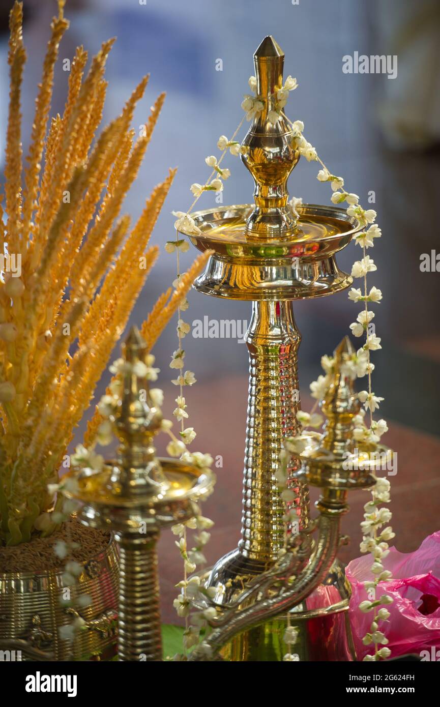 Traditional brass oil lamp during a Hindu wedding ceremony Stock Photo ...