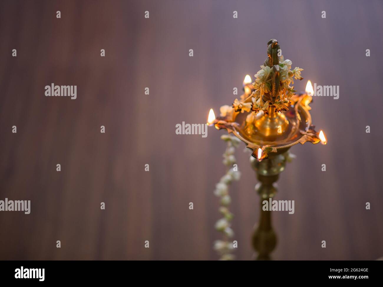 Traditional Indian brass oil lamp during a wedding ceremony Stock Photo ...