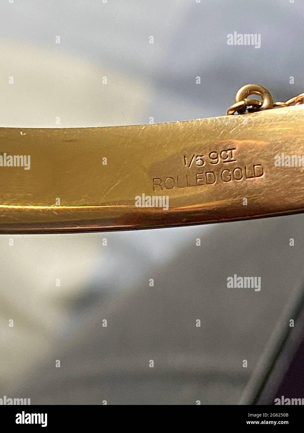 rolled gold hallmark stamp on bracelet 1/5 9ct gold Stock Photo - Alamy
