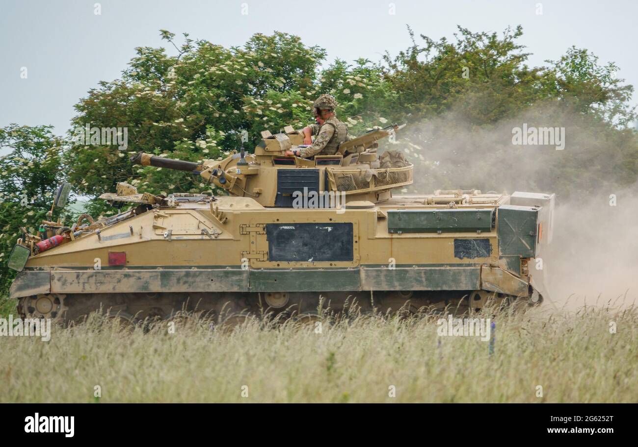 british army Warrior FV510 infantry fighting vehicle in action on a ...