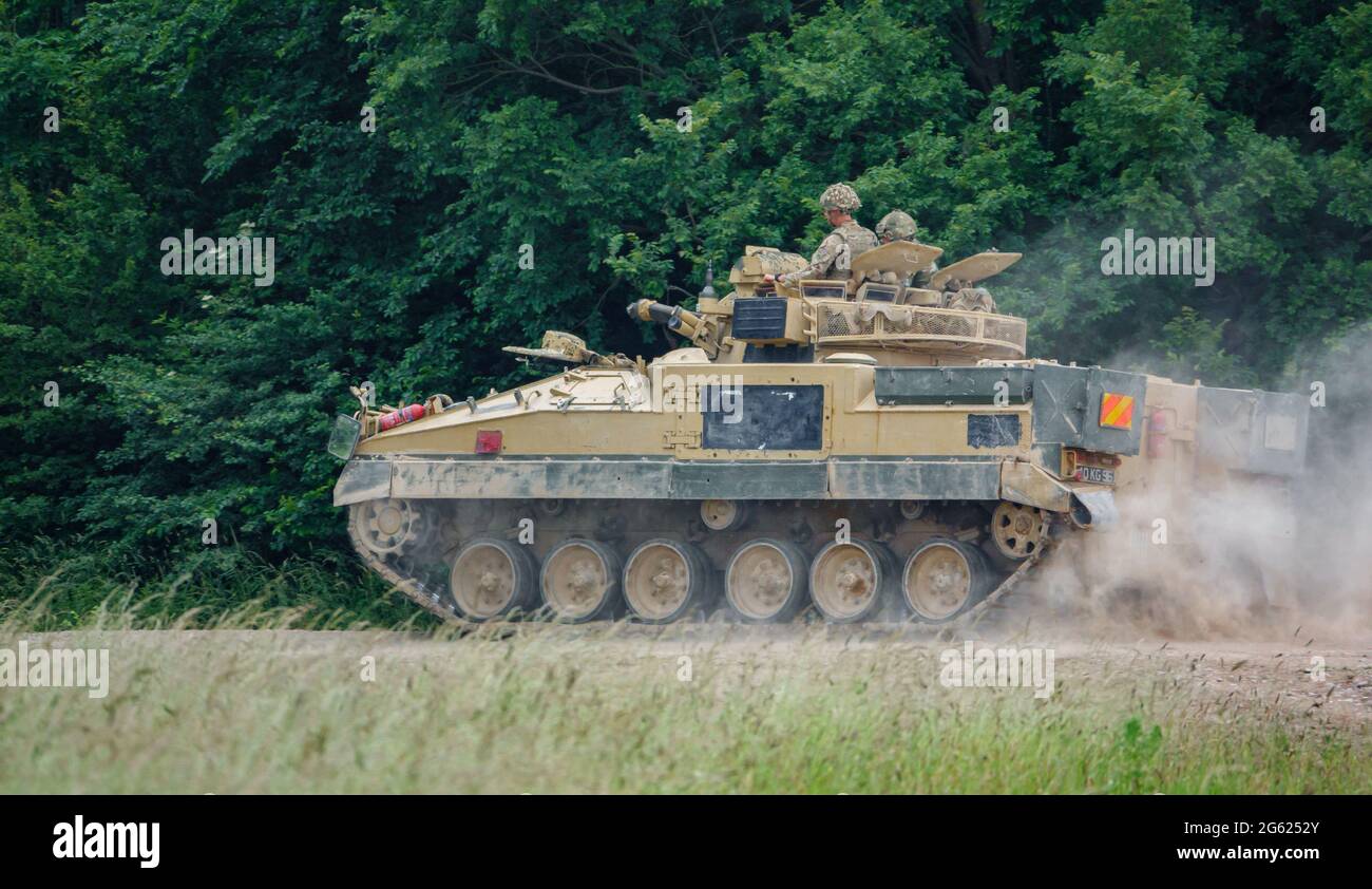 british army Warrior FV510 infantry fighting vehicle in action on a ...