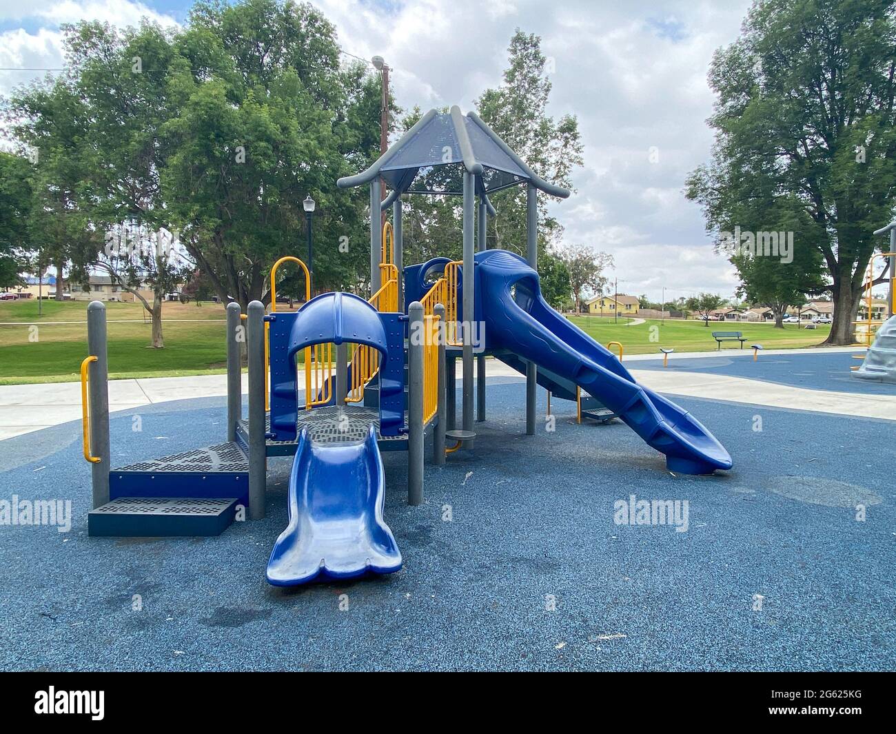 Children playground activities in public park. Slide, swing on modern ...