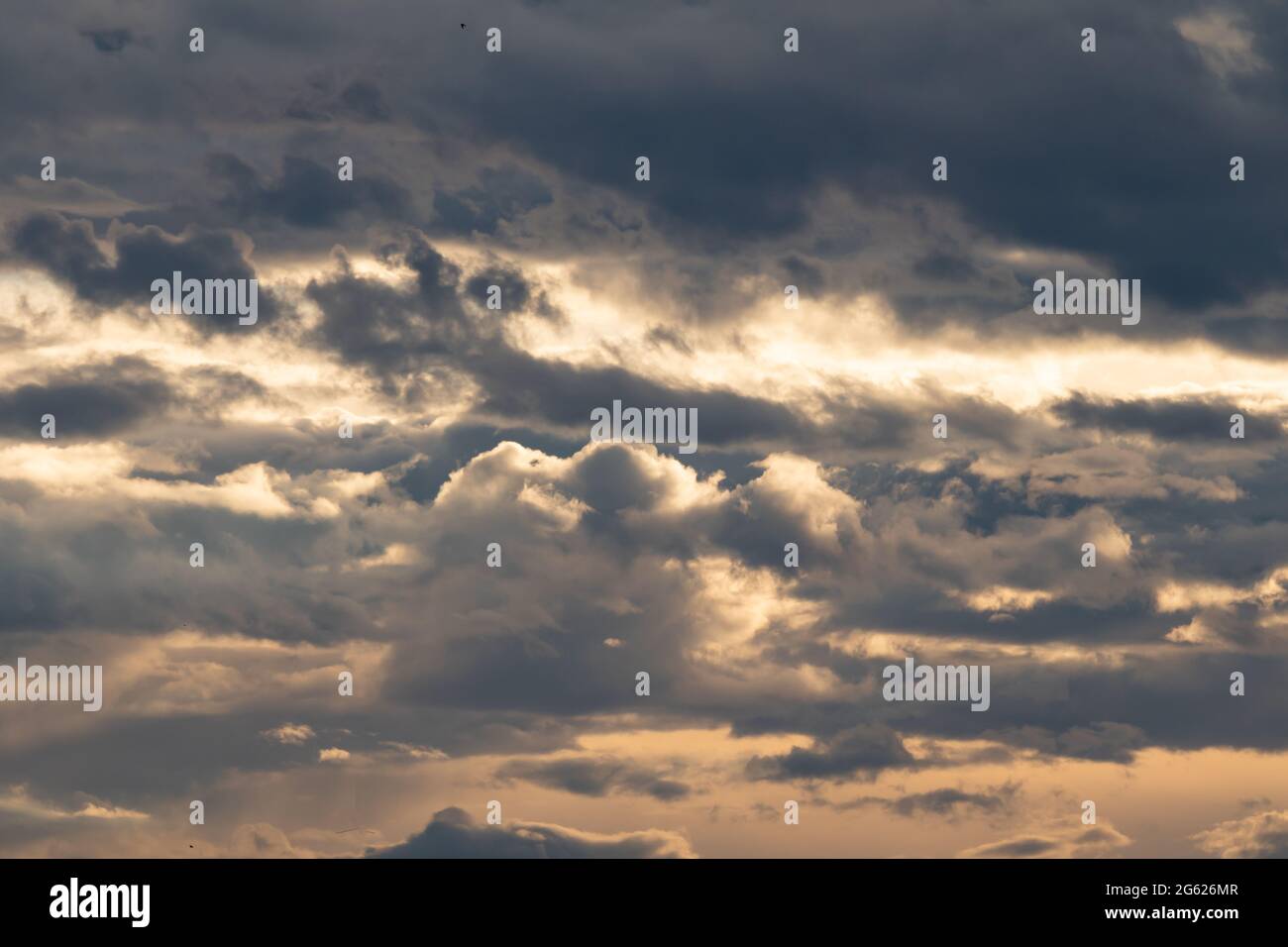 dramatic cloudscape with and dark clouds on blue sky Stock Photo - Alamy
