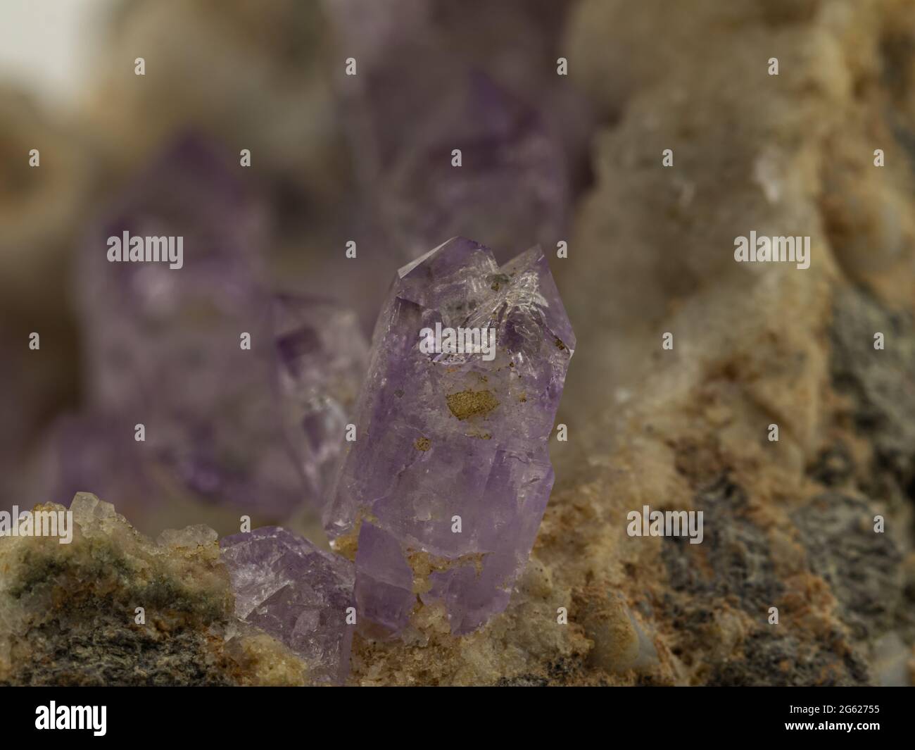 semi-transparent purple amethyst quartz crystals on matrix Stock Photo ...