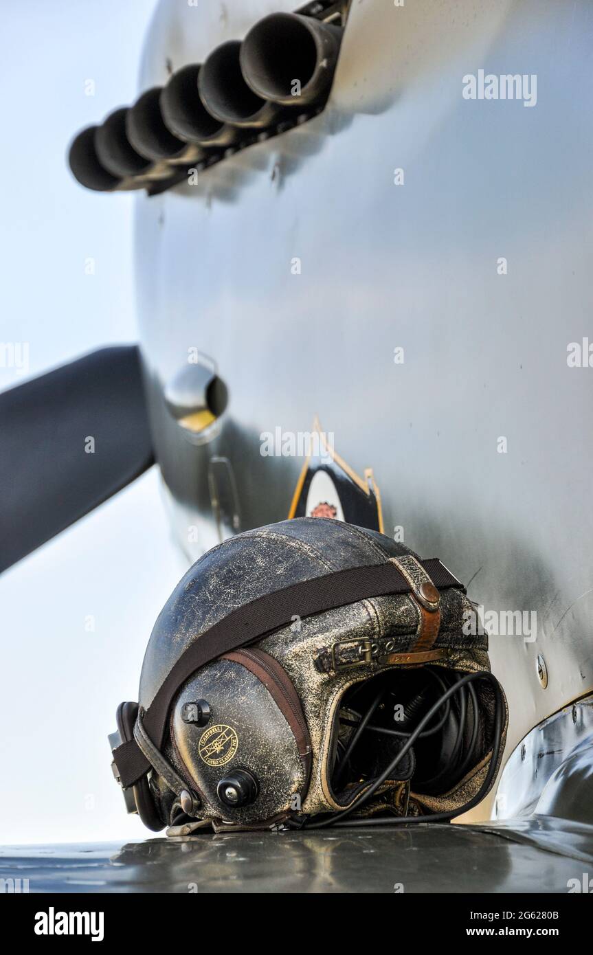 Vintage looking flying helmet on the wing of a Second World War ...