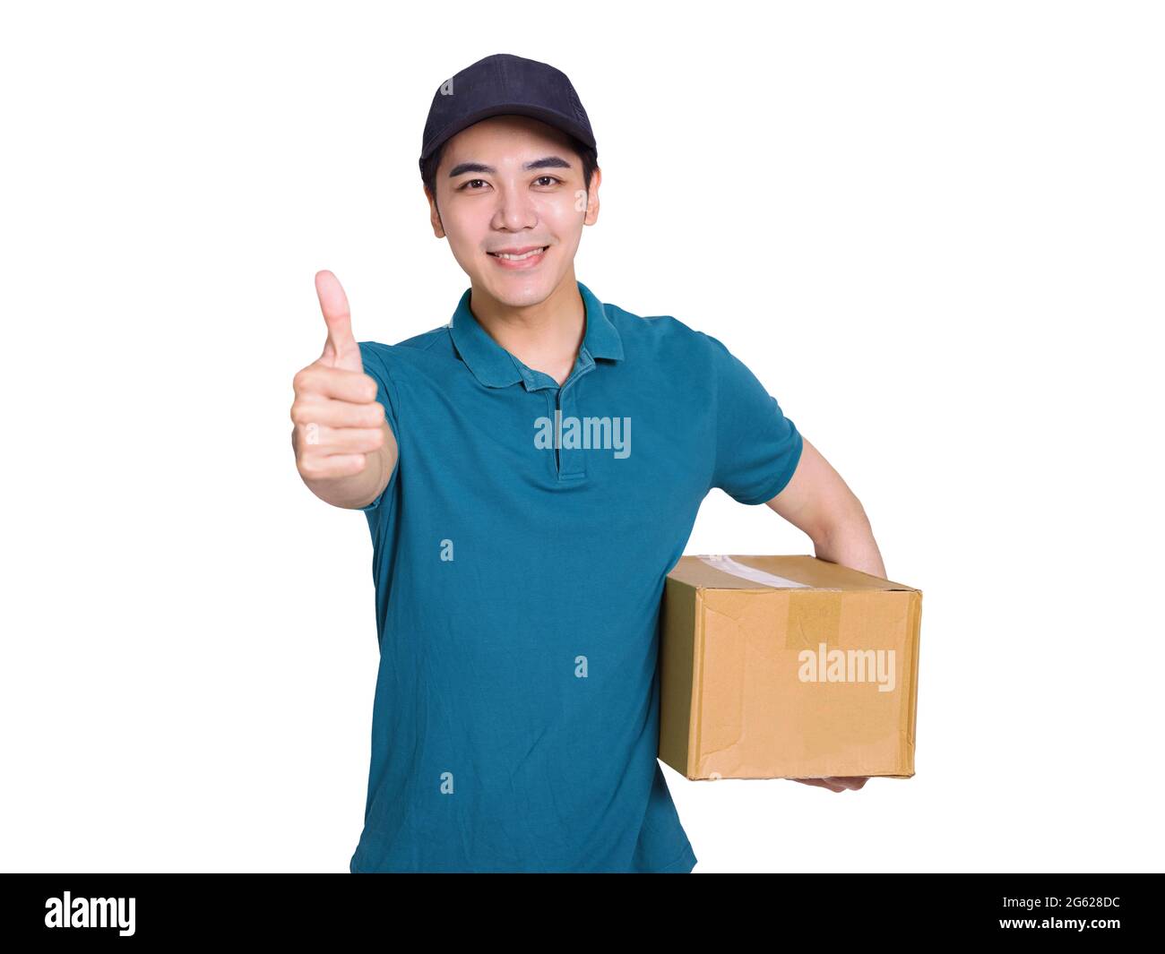 Young delivery man holding carton package and showing thumbs up Stock ...