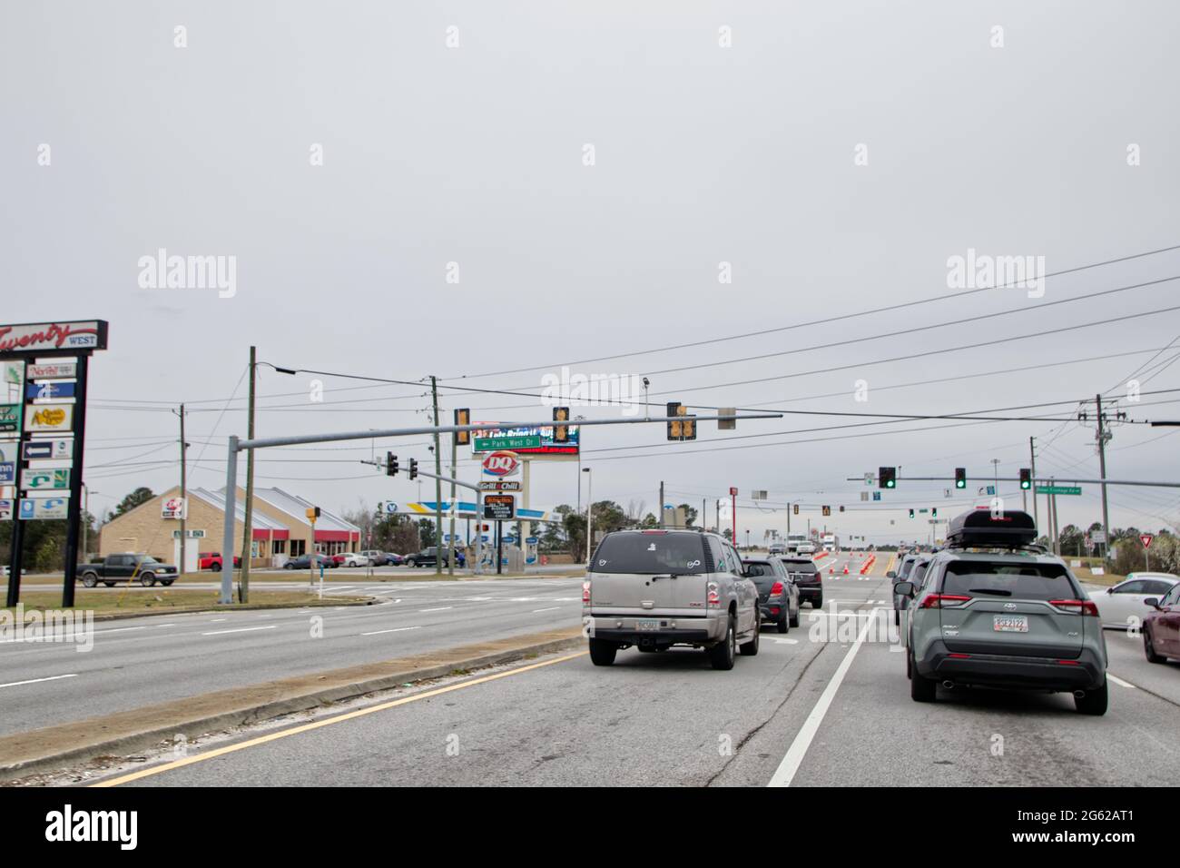 Augusta, Ga USA - 03 06 21: Traffic in an urban area with signs and ...