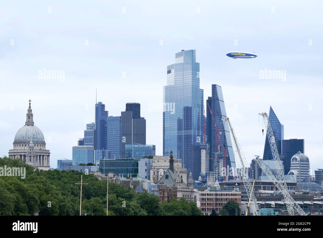 The Goodyear Blimp drifts over the London skyline in its first visit in ...