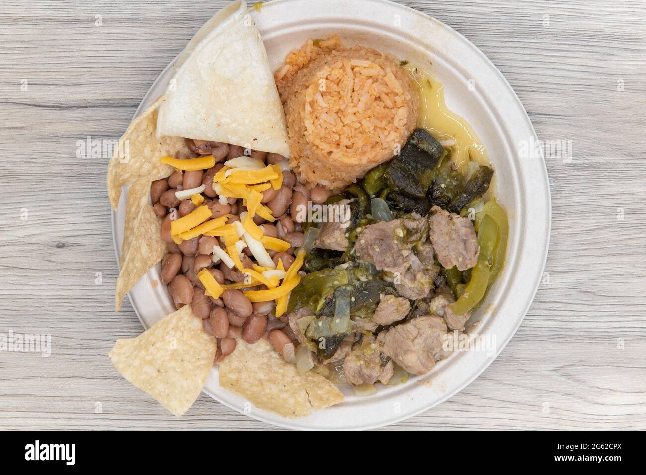Overhead view of delicious chunks of chile verde pork meat smothered in ...