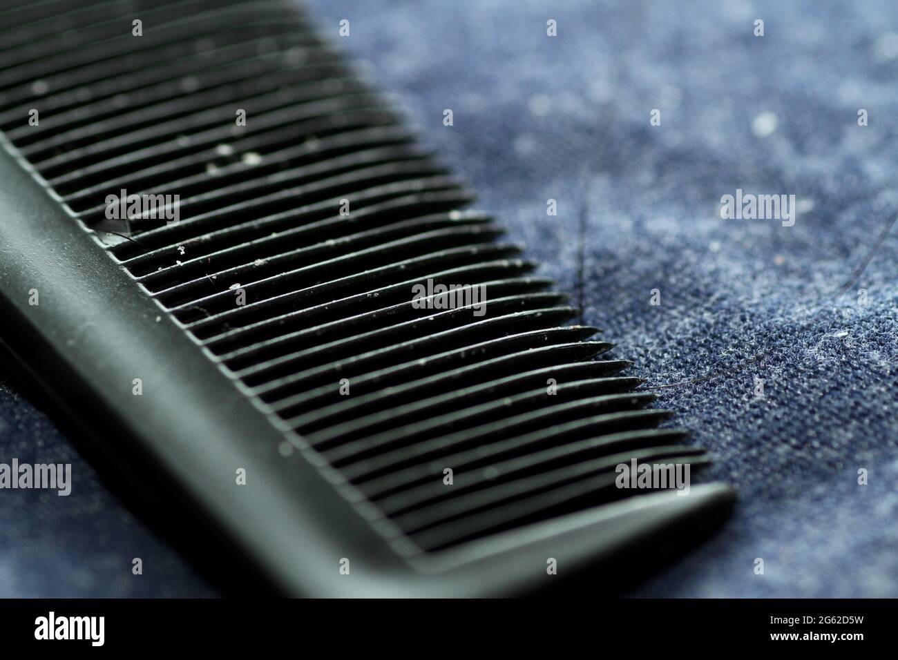 Dandruff stick on plastic comb Stock Photo - Alamy
