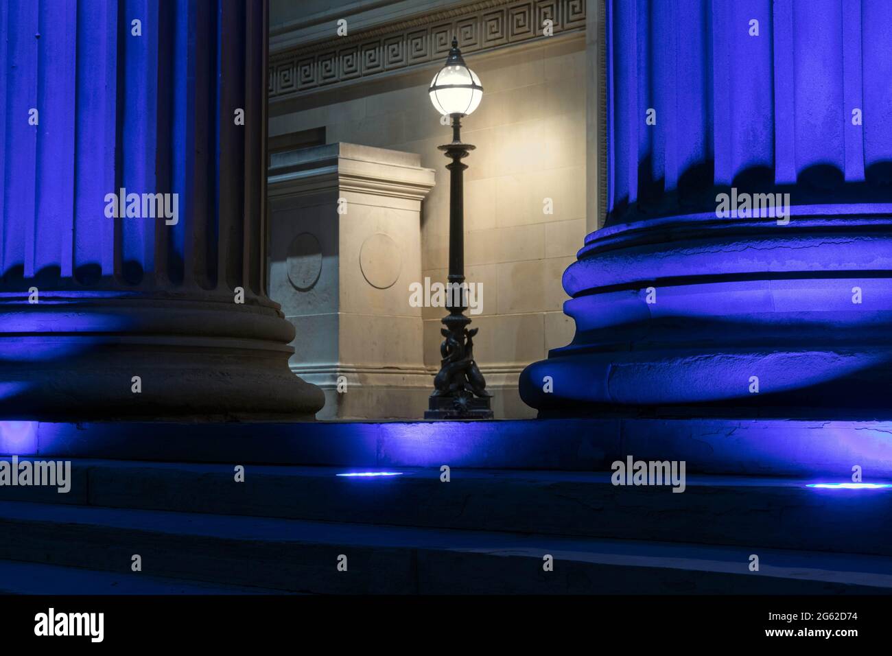Stone columns on St George's Hall, Liverpool, floodlit in rainbow ...