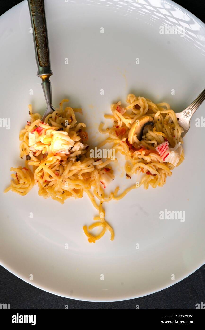 Rolled pasta on a fork hi-res stock photography and images - Alamy