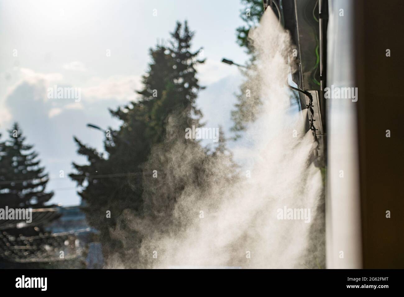 water spray system for cooling in a public cafe at the boiling hot ...