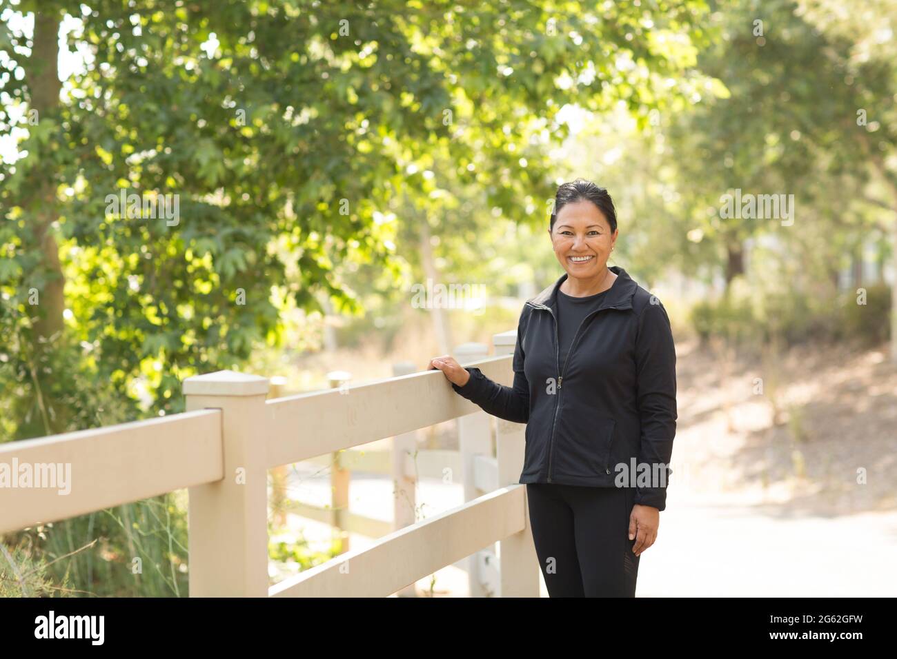 Portrait of a fit Asian woman exercising Stock Photo - Alamy