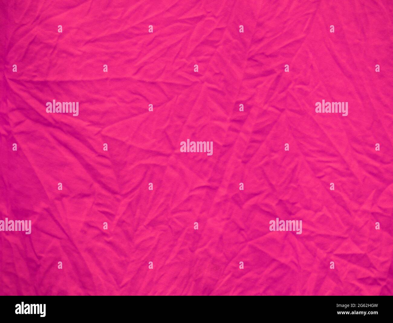 Pink color textile cloth texture with silk line presenting on ...