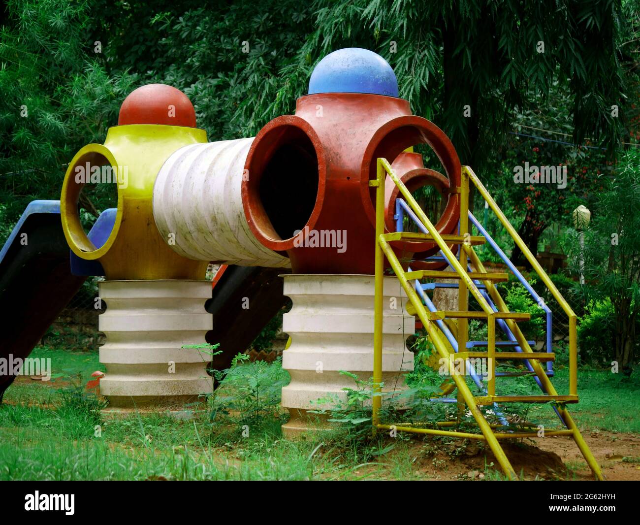 Children play structure presented on green natural garden background ...