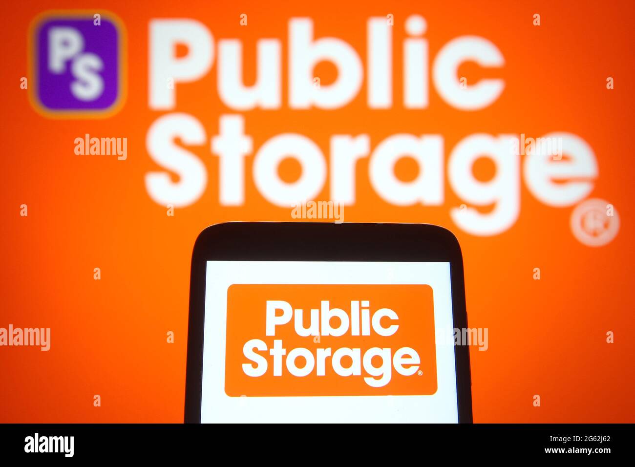 In this photo illustration a Public Storage logo is seen on a ...