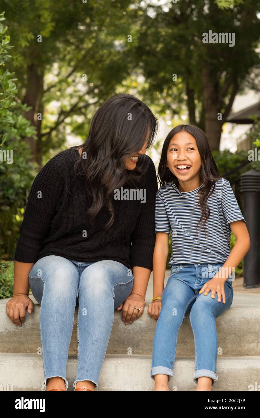 Indian mother and daughter hugging hi-res stock photography and images - Alamy