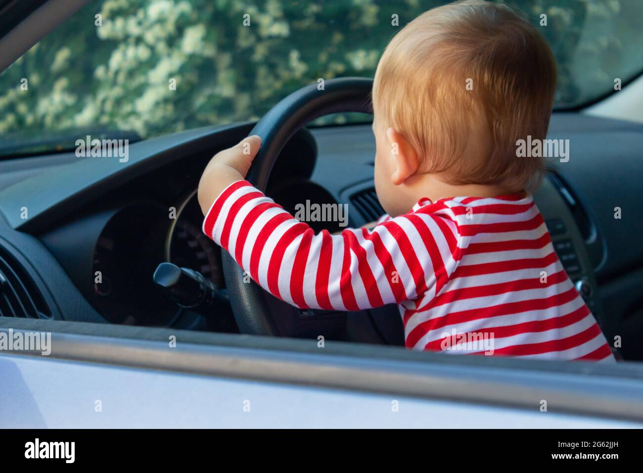 Baby boy driver. Travel with kids concept Stock Photo - Alamy