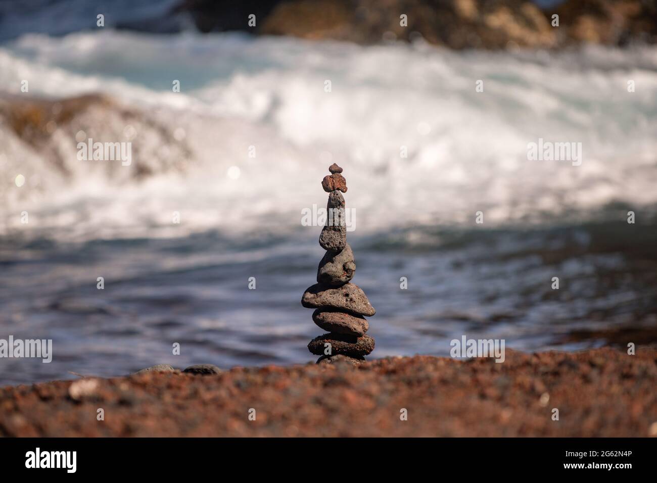 Pyramid of sea pebbles on beach. Life balance and harmony concept ...