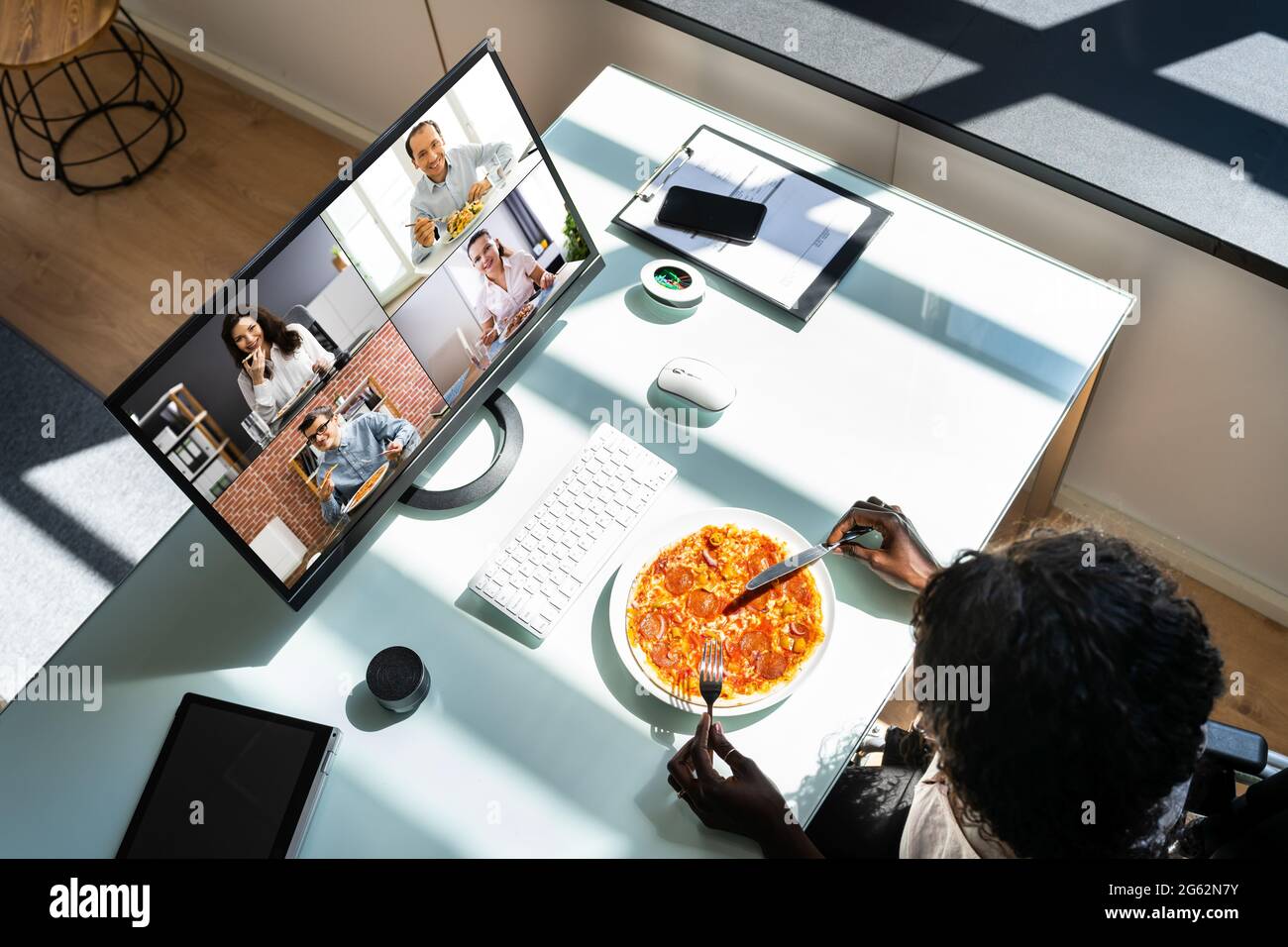 African Women Eating Virtual Video Lunch On PC Stock Photo - Alamy