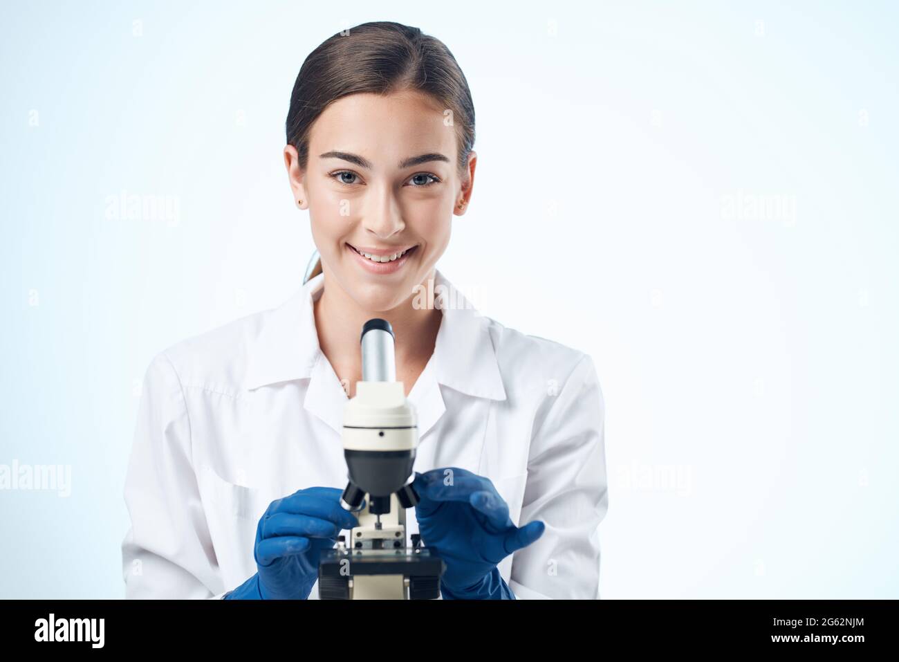 female doctor laboratory research microscope science Stock Photo - Alamy